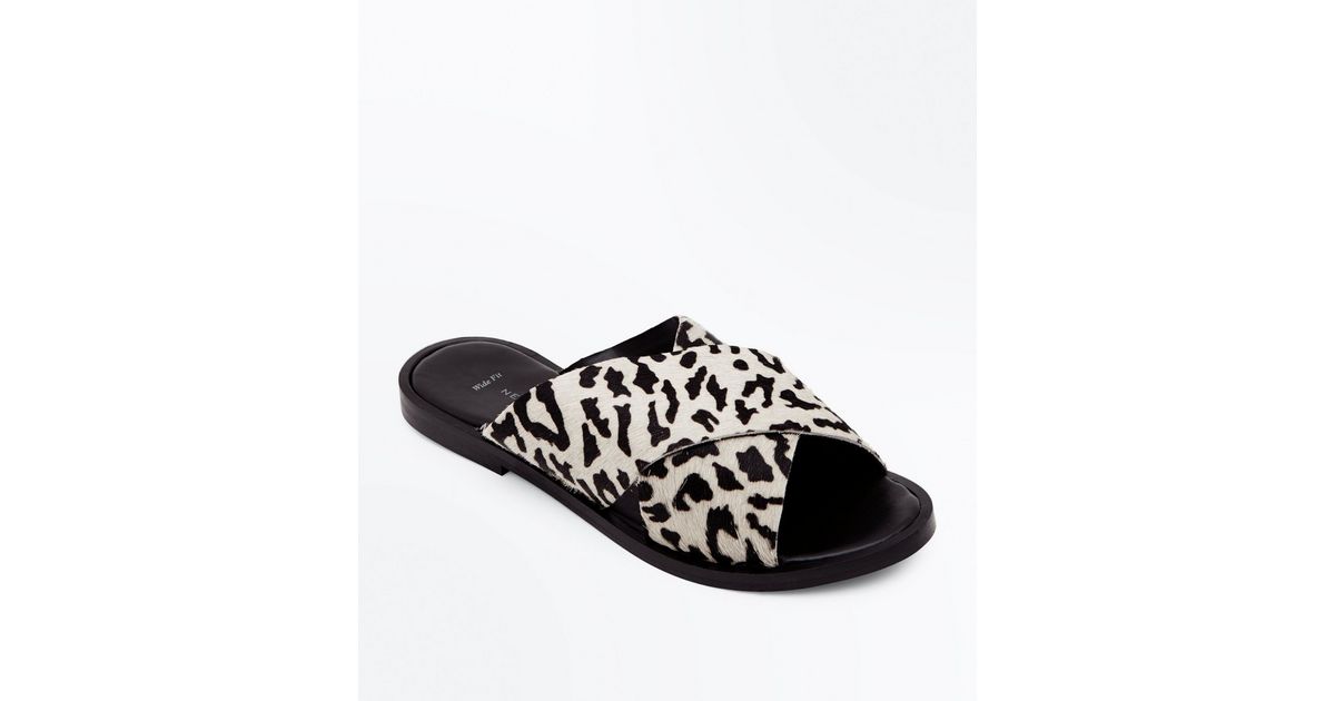 Wide Fit Cream Leather Leopard Print Sliders | New Look