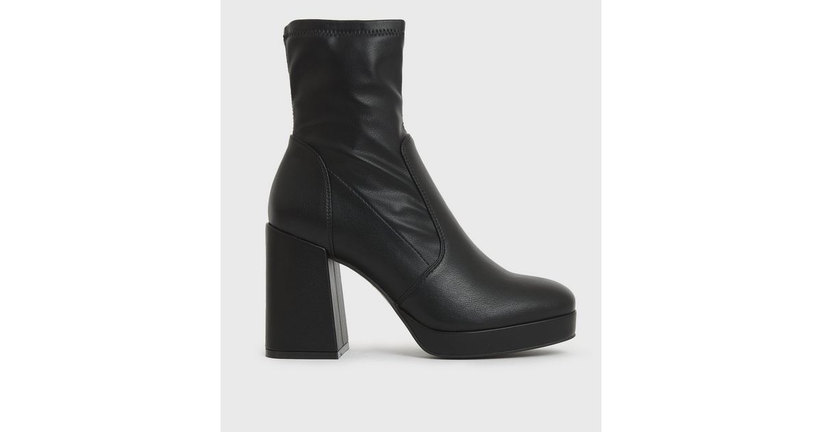 Black Flared Block Heel Platform Boots New Look
