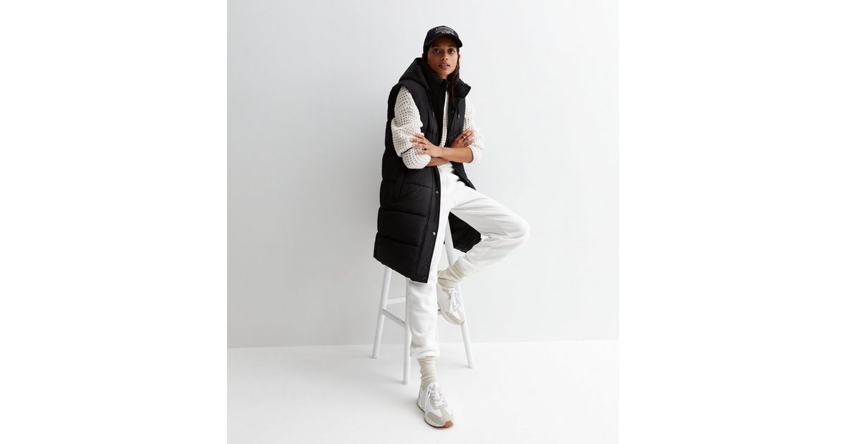 Black Long Hooded Puffer Gilet | New Look