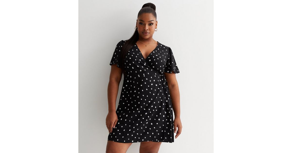 Curves Black Spot Print Angel Sleeve Wrap Mini Dress | New Look