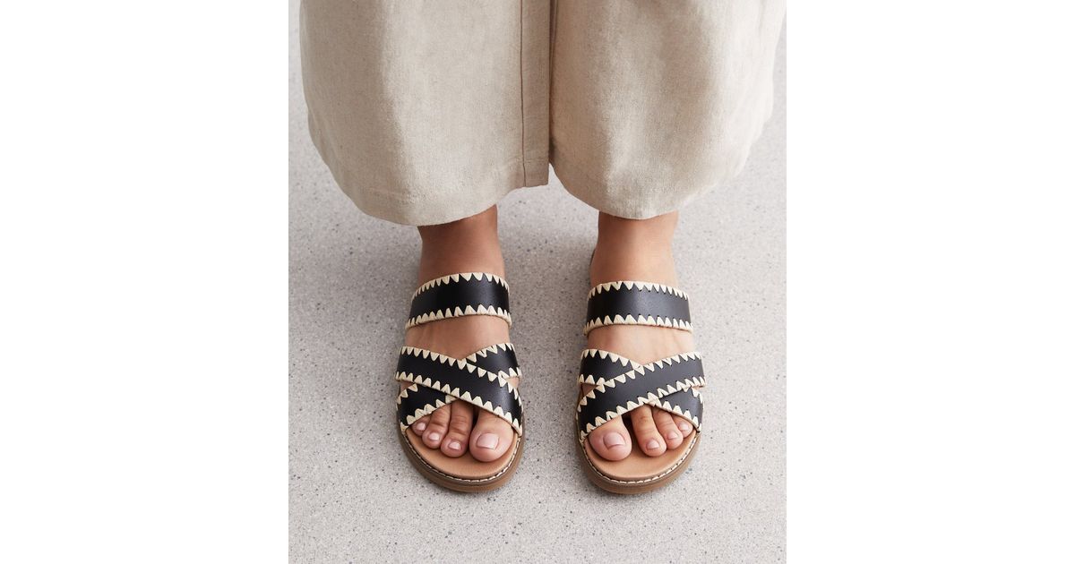 Black Leather-Look Whipstitch Cross Over Sliders | New Look