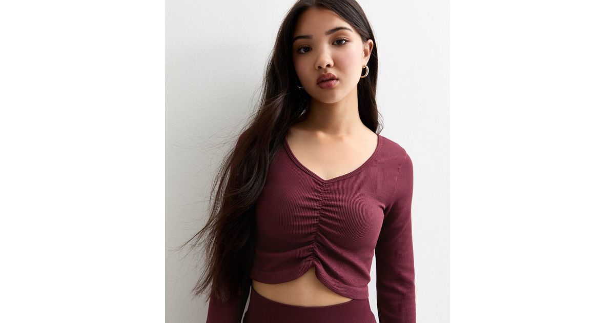 Girls Burgundy Ribbed Ruched Long Sleeved Sports Top | New Look