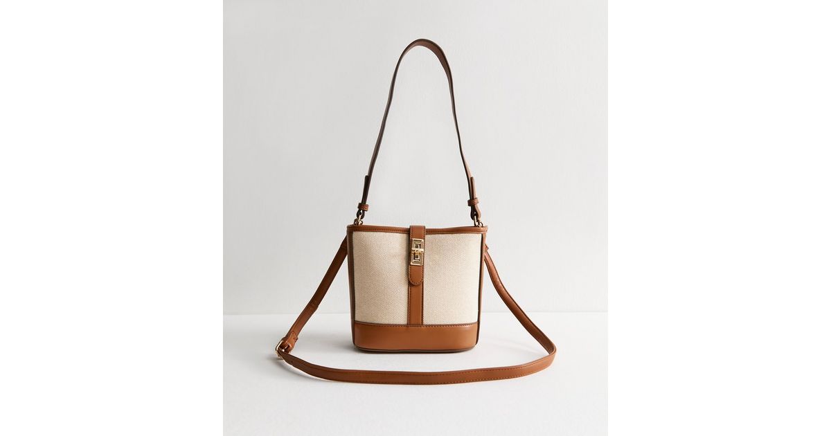Brown Faux Leather Twist Lock Canvas Bucket Bag | New Look