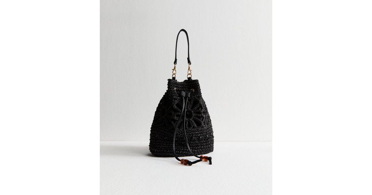 Black Floral Woven Raffia Look Drawstring Bucket Bag | New Look