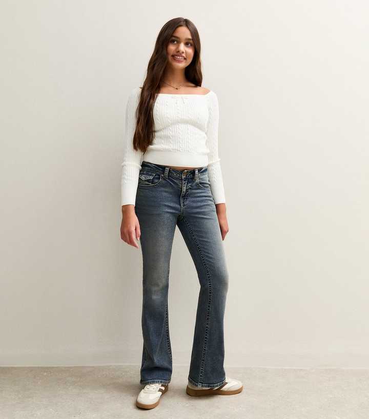 Girls Blue Faded Low Rise Flared Jeans | New Look